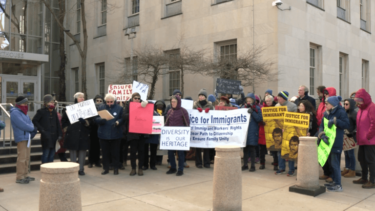 Erie religious groups protest Trump immigration policies in downtown Erie