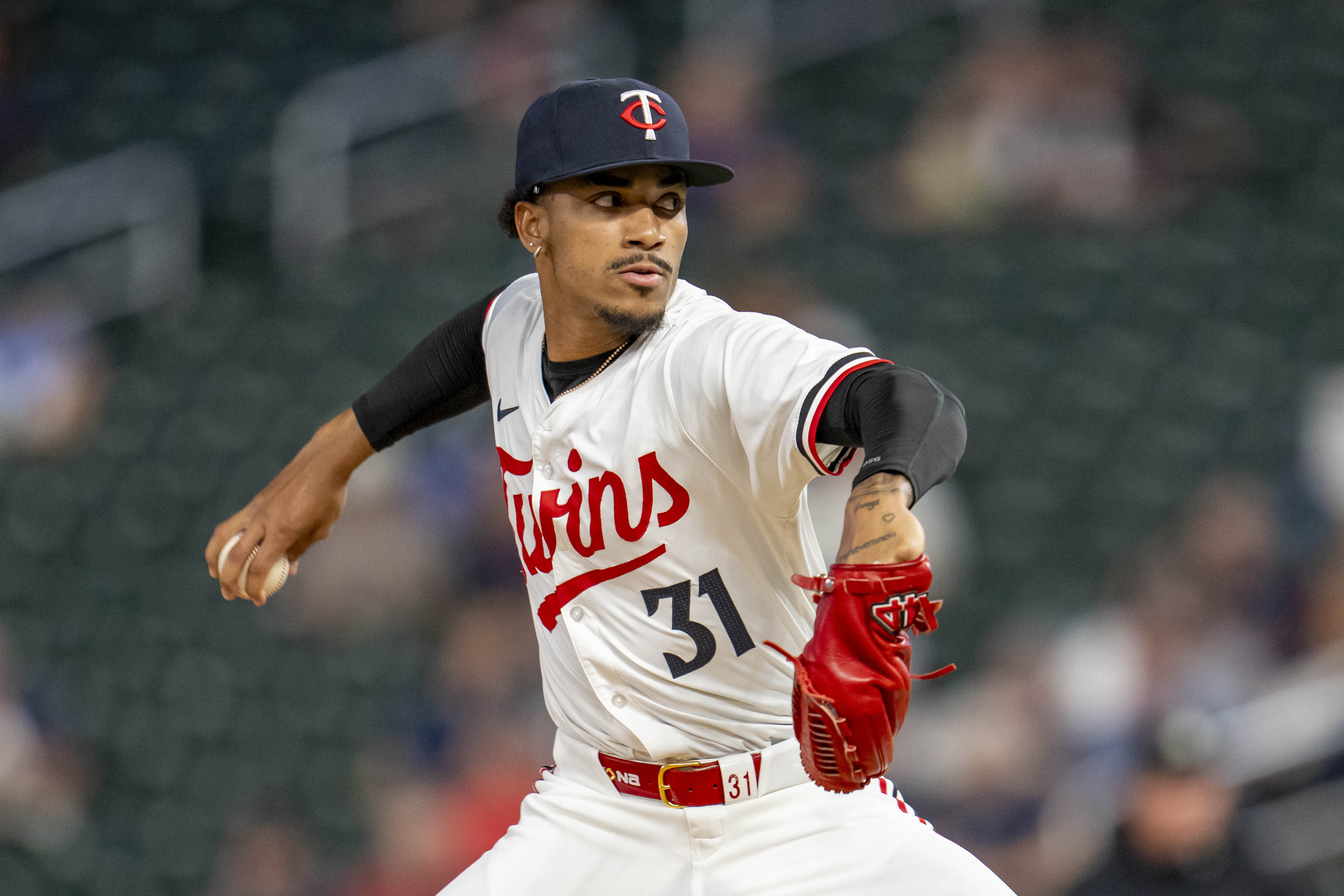 Twins designate right-hander for assignment
