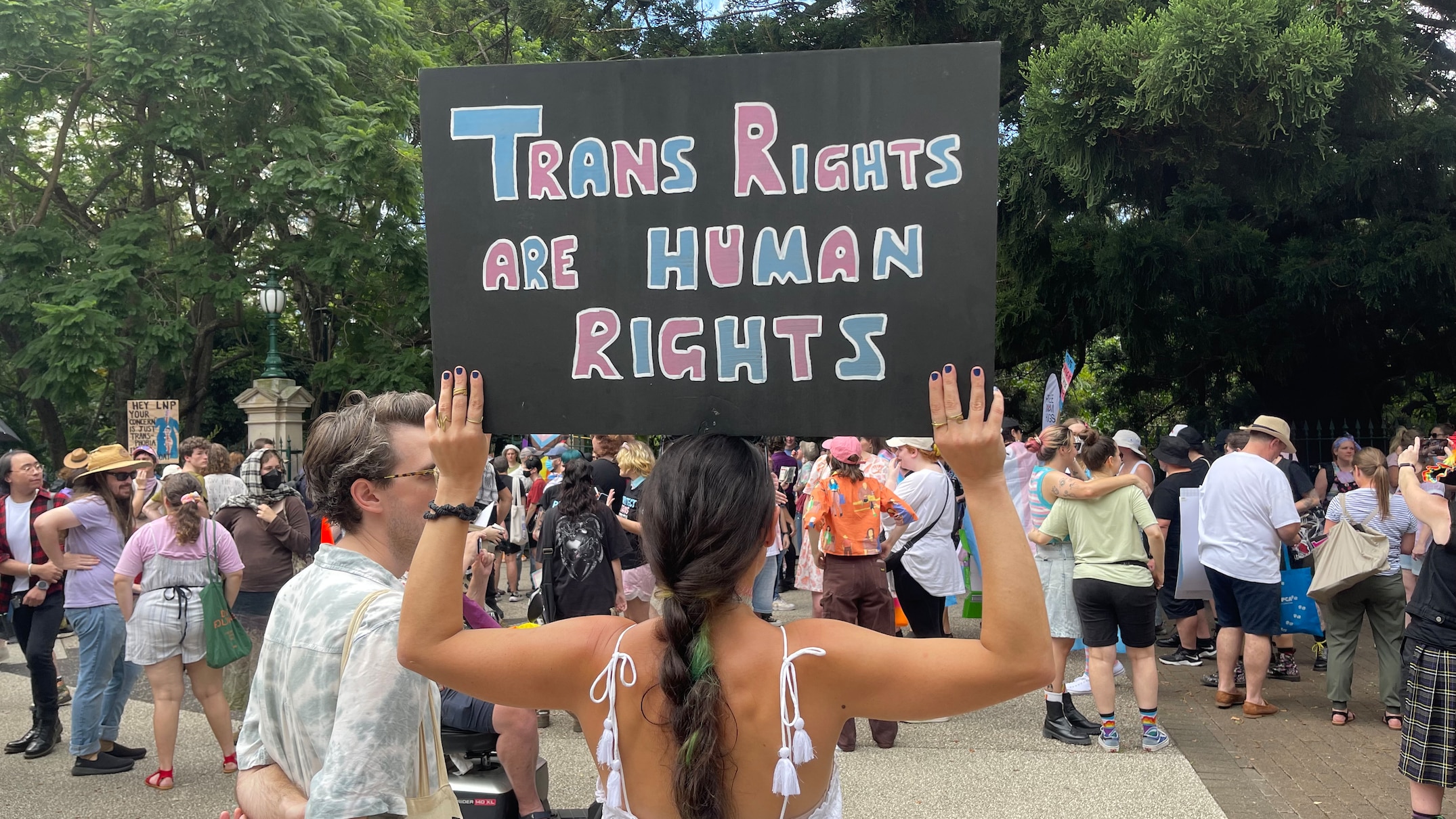 Rallies held to protest Queensland pause on hormone treatment for new ...