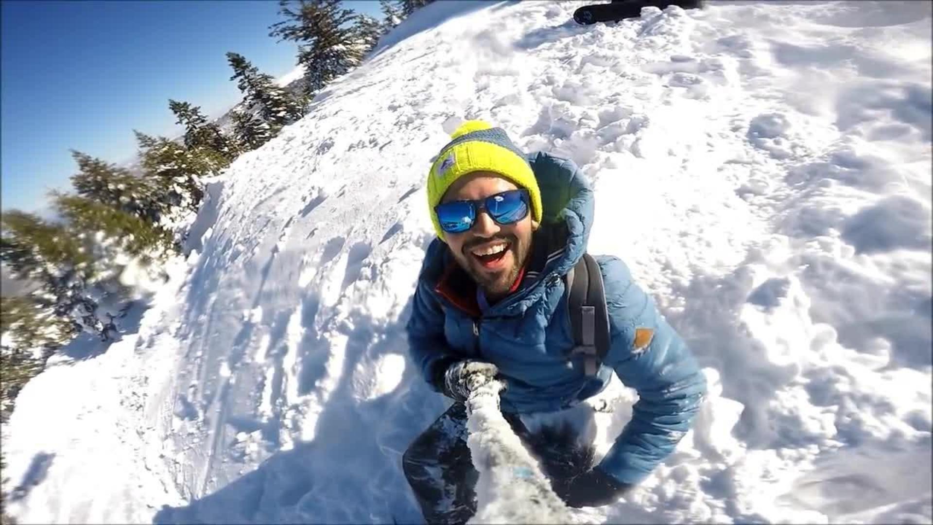 Snowboarder Crashes into Camera