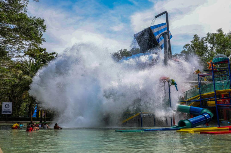 Giant bucket, epic slide—Escape Penang splashes into the record books!