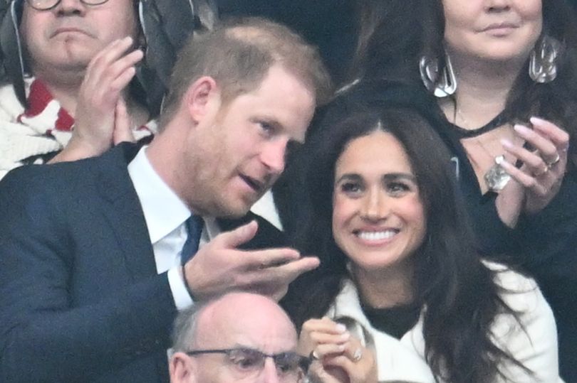Meghan Markle and Prince Harry watch from the stands as Katy Perry ...