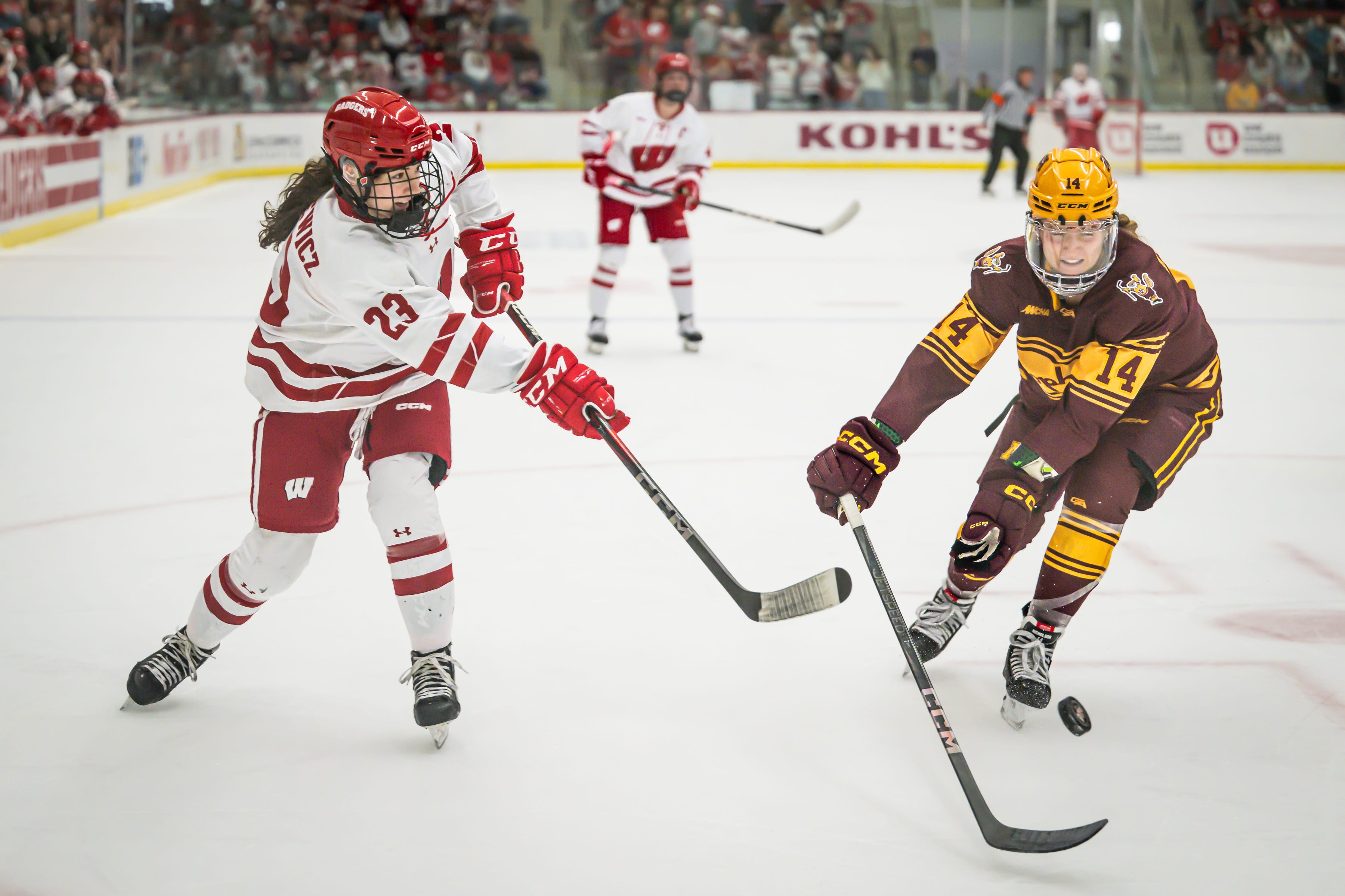 A last-minute goal gives Wisconsin another WCHA tournament title