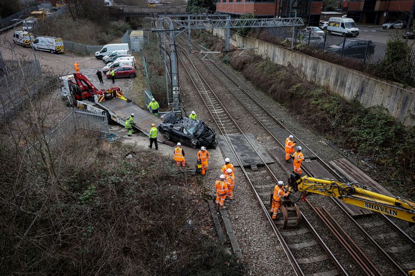 Police issue update on railway bridge crash which caused train chaos