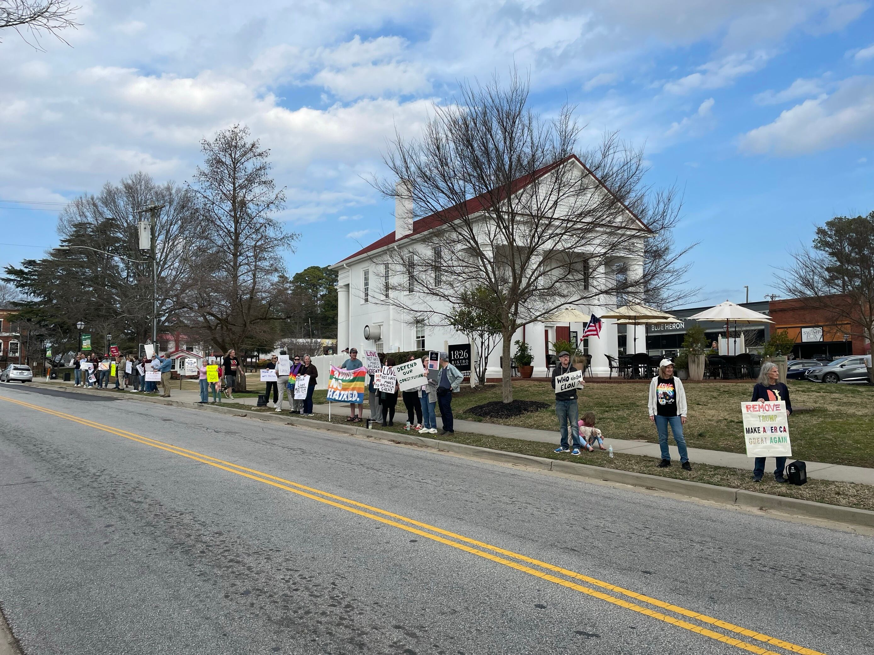 Protestors rally outside Sen. Graham’s office in Pendleton