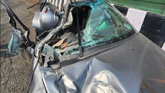 Driver killed, passenger injured after container trailer knocks car down