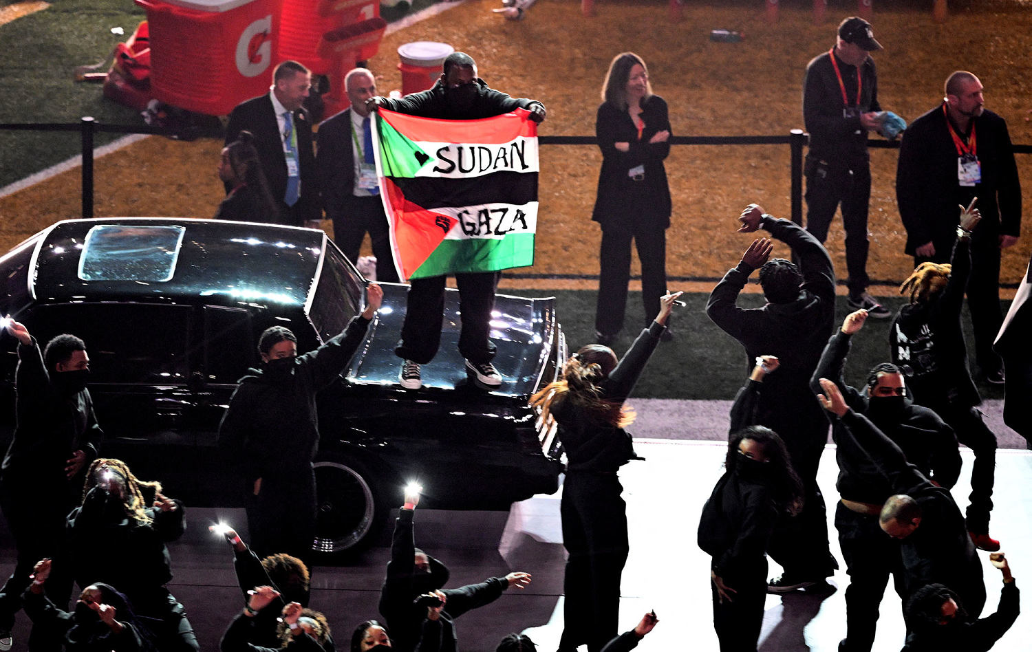 Super Bowl protester explains why he displayed Palestinian, Sudanese ...