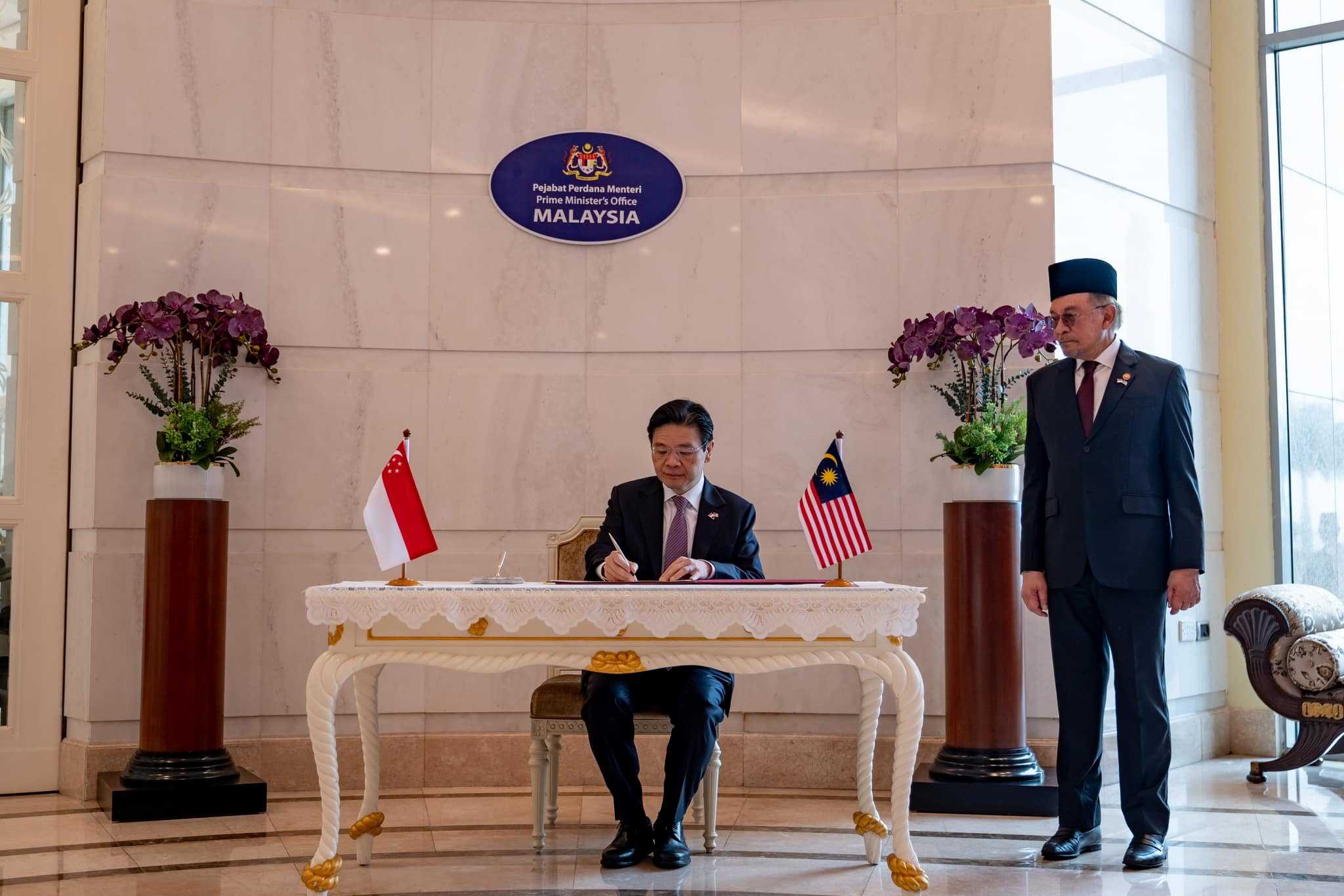 Who benefits more from Johor-Singapore economic zone?