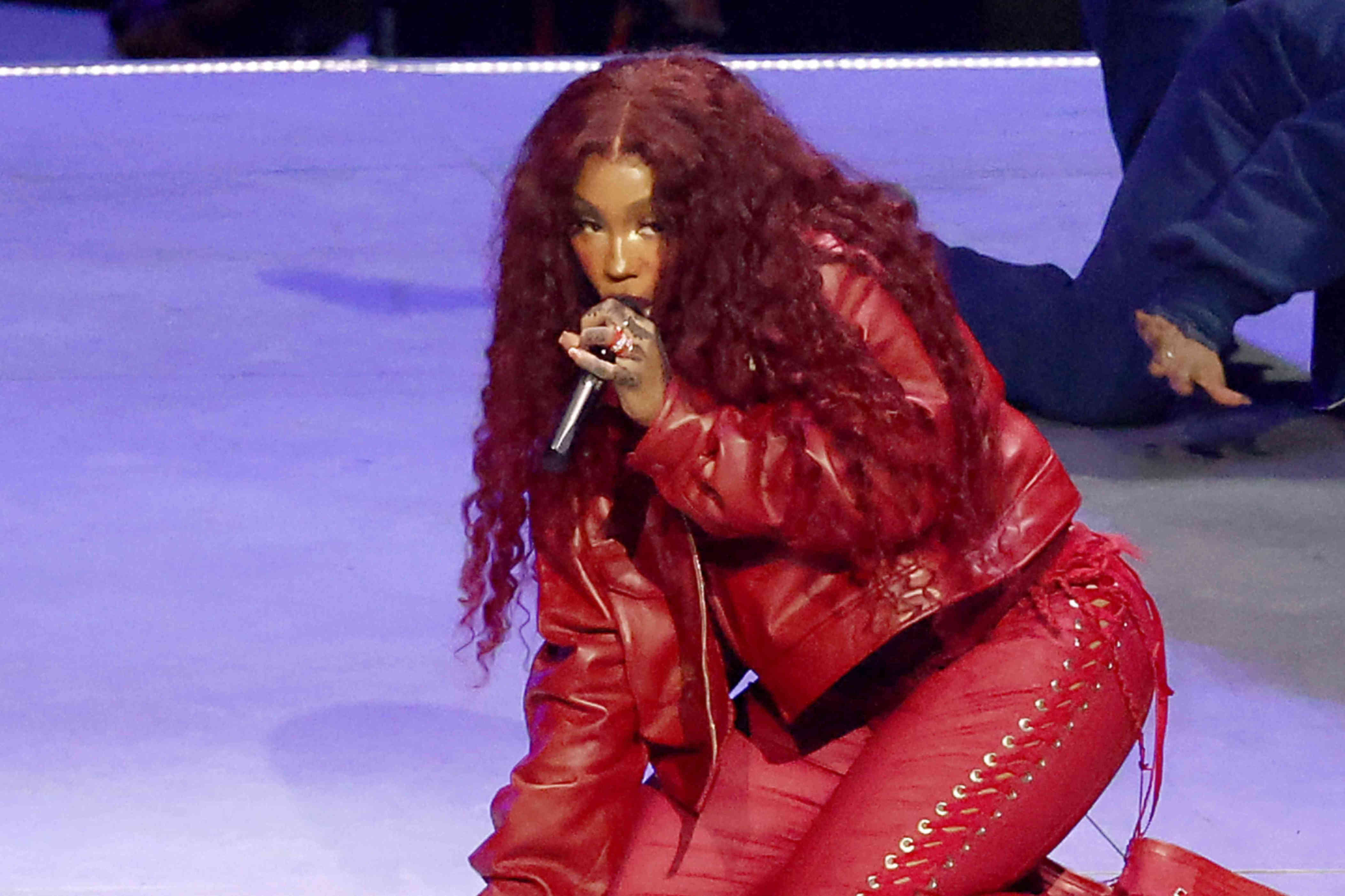 SZA's Lace Corset Matched Her Red Hair During the Super Bowl Halftime Show