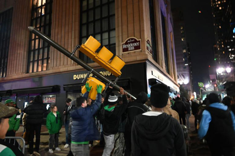 Super Bowl chaos in Philadelphia as riots break out after Eagles seal ...