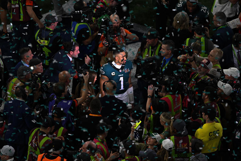 Jalen Hurts silently standing in confetti after the Eagles' Super Bowl win is the coldest photo