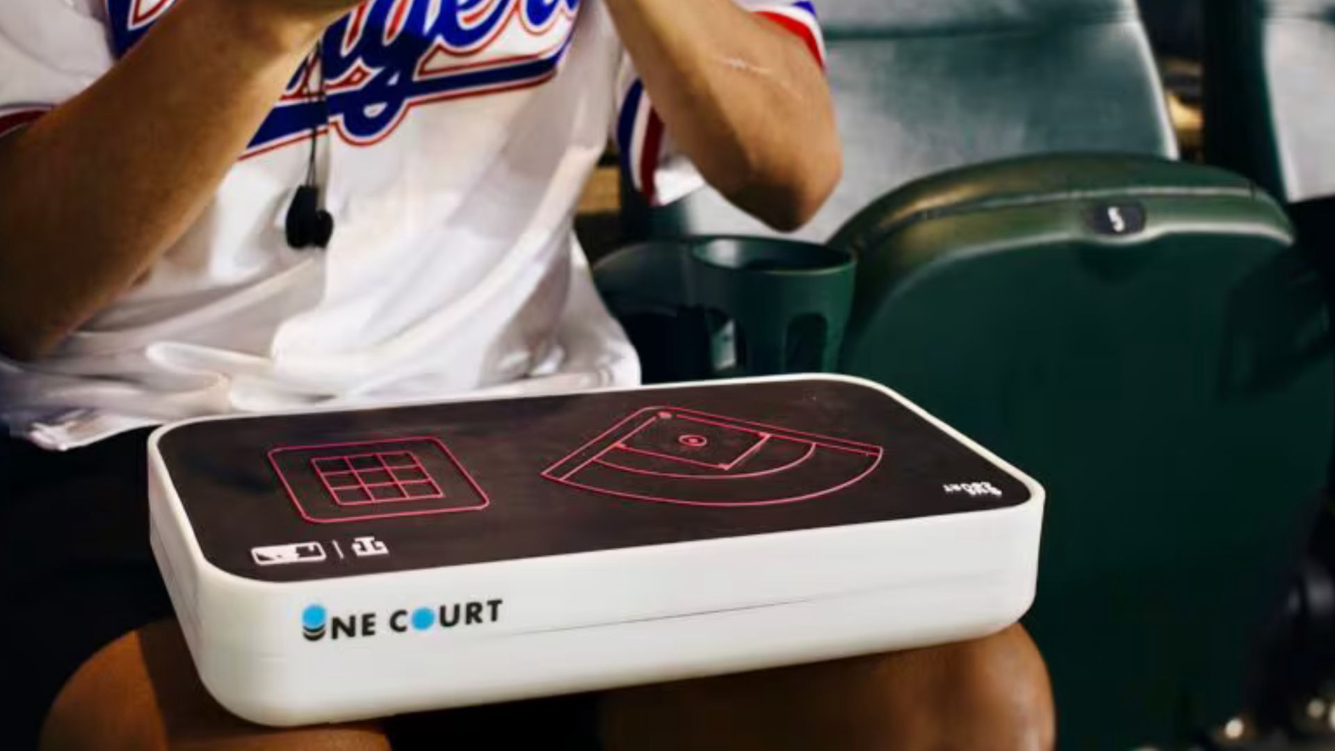 Photos: Braille-like sports tech helps blind fans track game action in ...