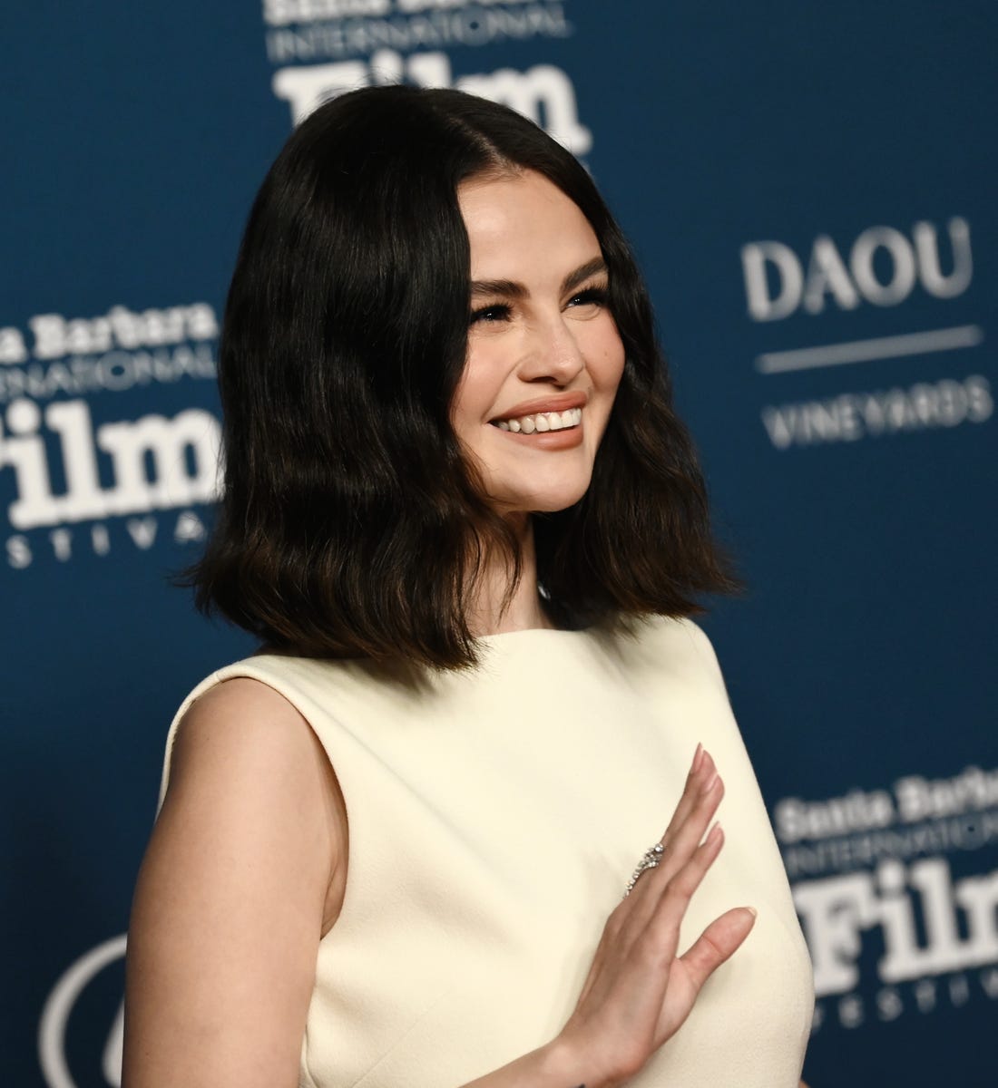 Selena Gomez's Ivory Minidress Repped Her Favorite Romantic Accessory