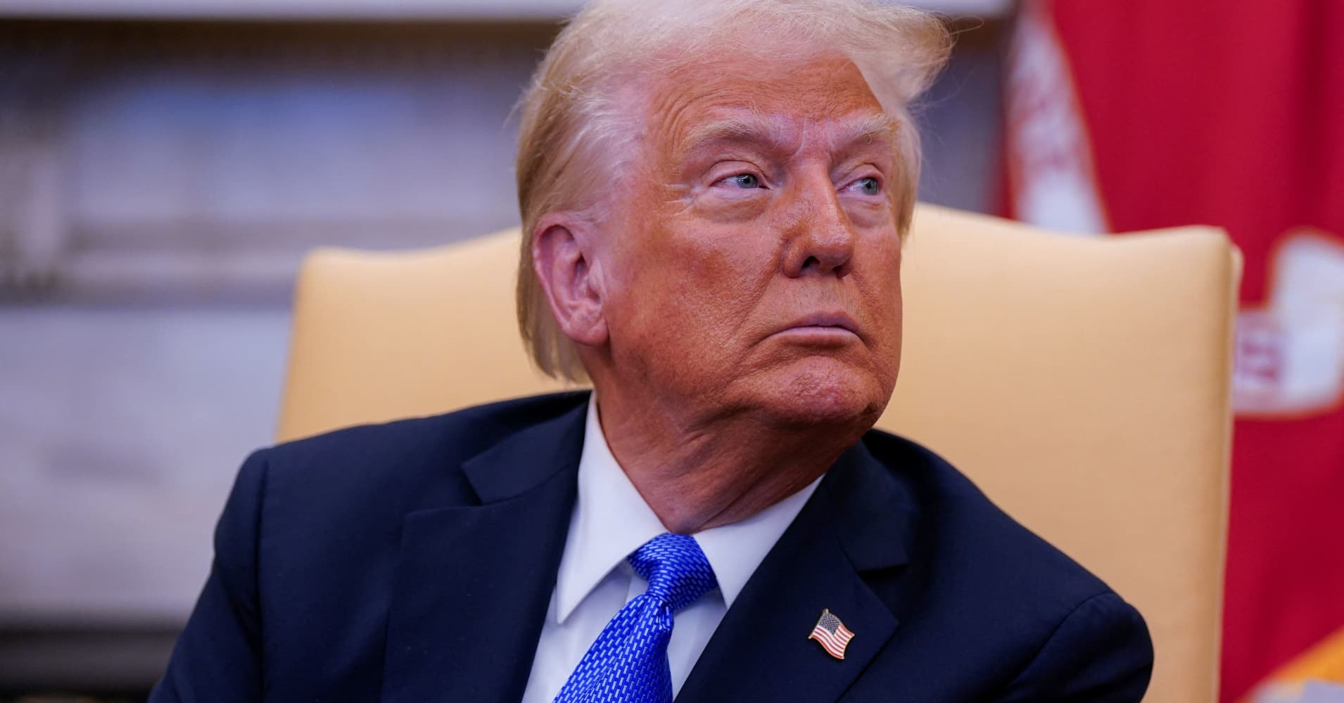 Trump's federal worker buyout plan will remain on hold for now, judge says