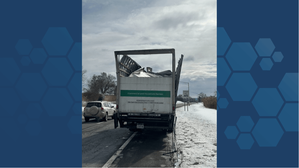 Box truck damaged after hitting bridge on Onondaga Lake Parkway
