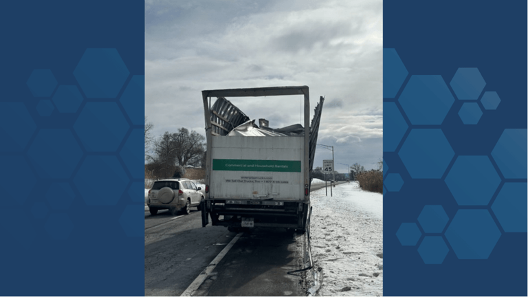 Box truck damaged after hitting bridge on Onondaga Lake Parkway