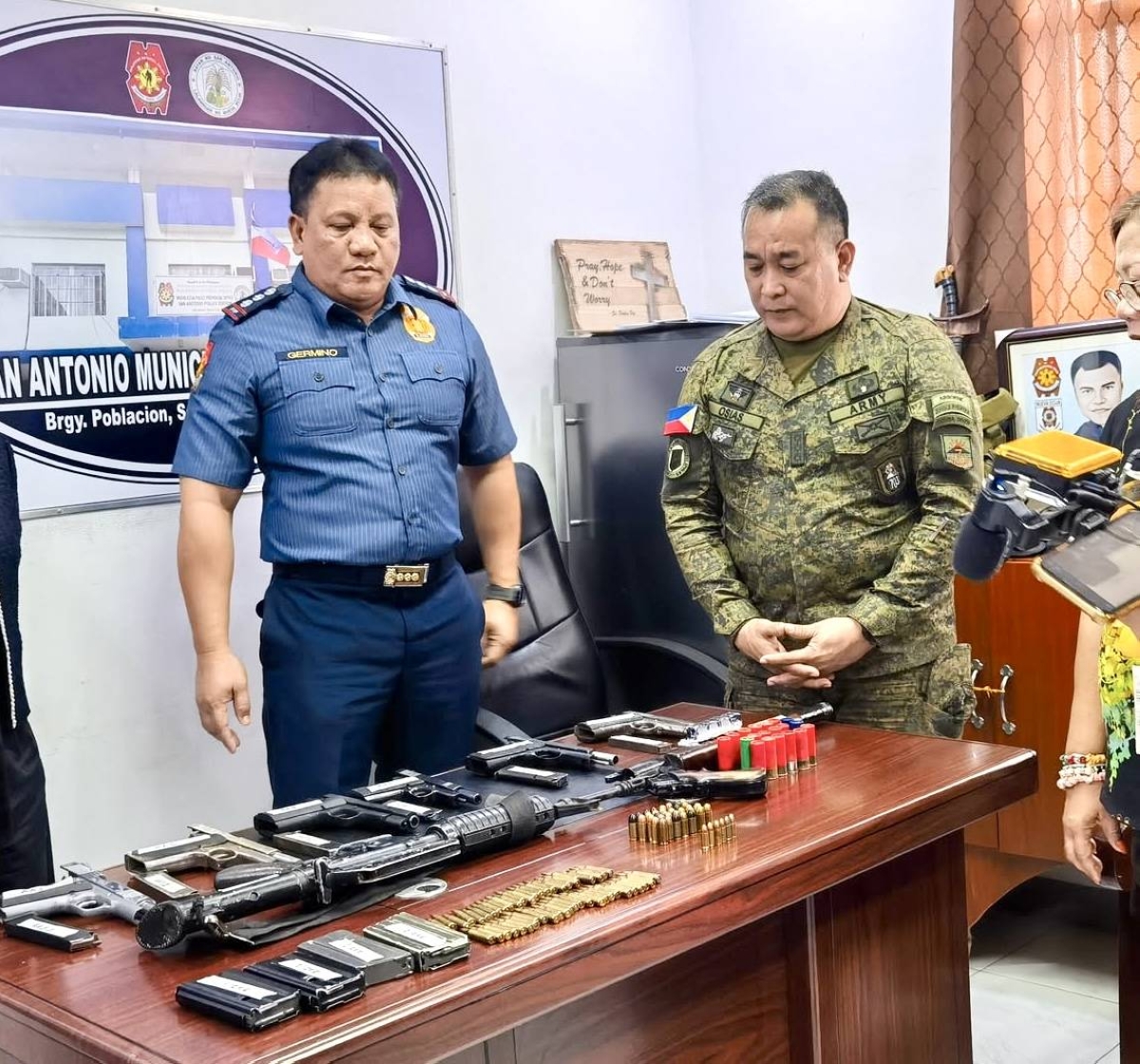Members of private army surrender firearms