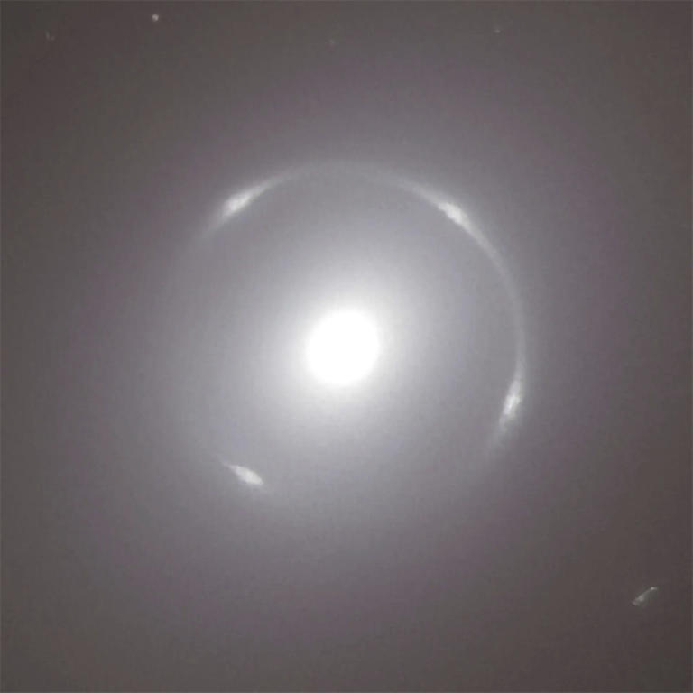 Space telescope spots rare 'Einstein ring' of light around galaxy in ...