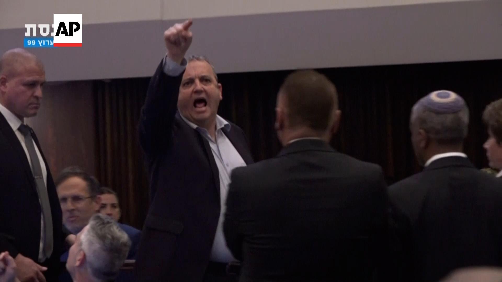 Israeli opposition members shout at Netanyahu as he tries to address ...
