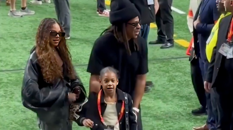 Rumi Carter Takes Fashion Cues From Blue Ivy At 2025 Super Bowl & Looks ...