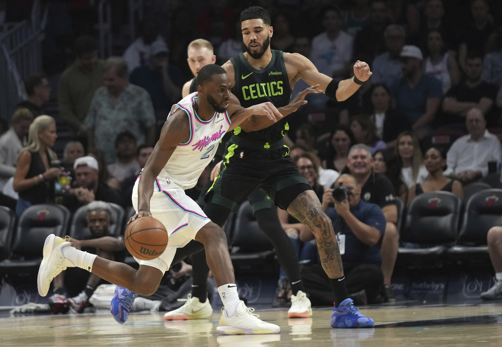 Jayson Tatum scores 33, Celtics hold Heat to 34% shooting and roll to ...