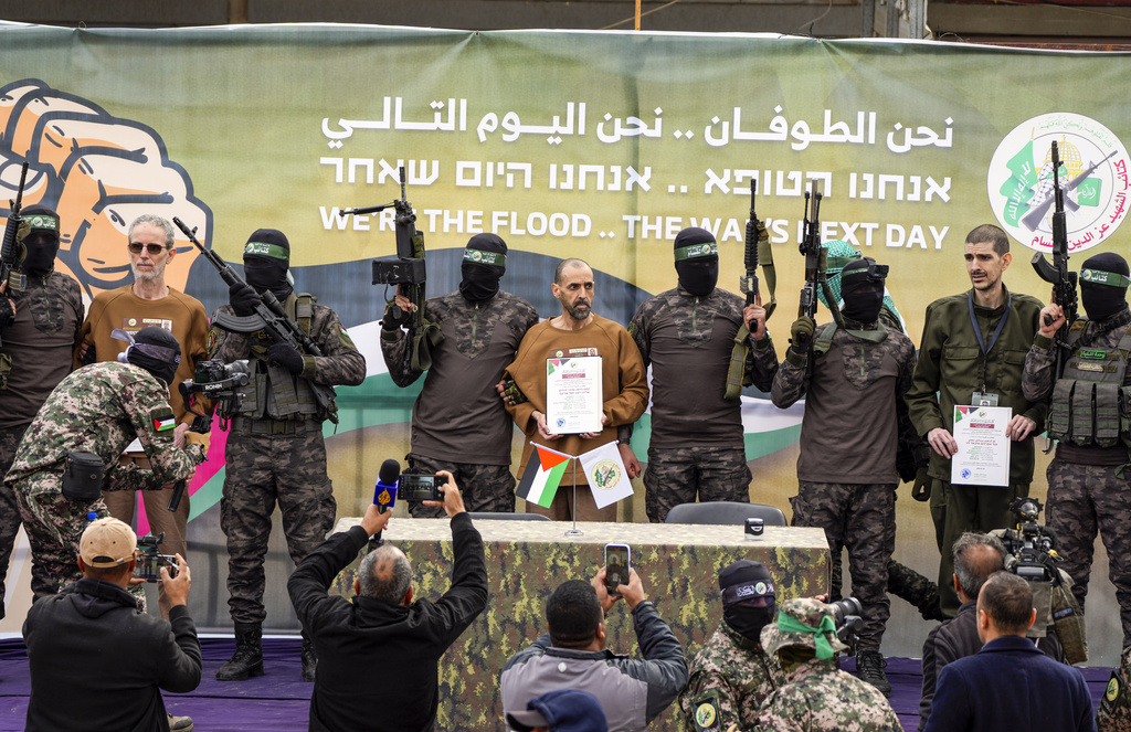 Hamas says it will delay the release of more hostages, putting Gaza ...