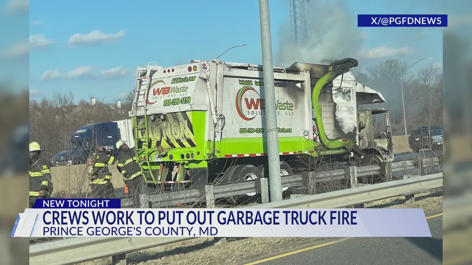 Crews work to put out garbage truck fire