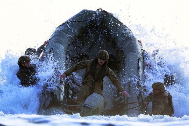 13 dramatic photos of Royal Marine Commandos practising in Cornish surf