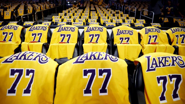 Luka Doncic T-shirts, explained: Lakers give away yellow No. 77 shirts ...