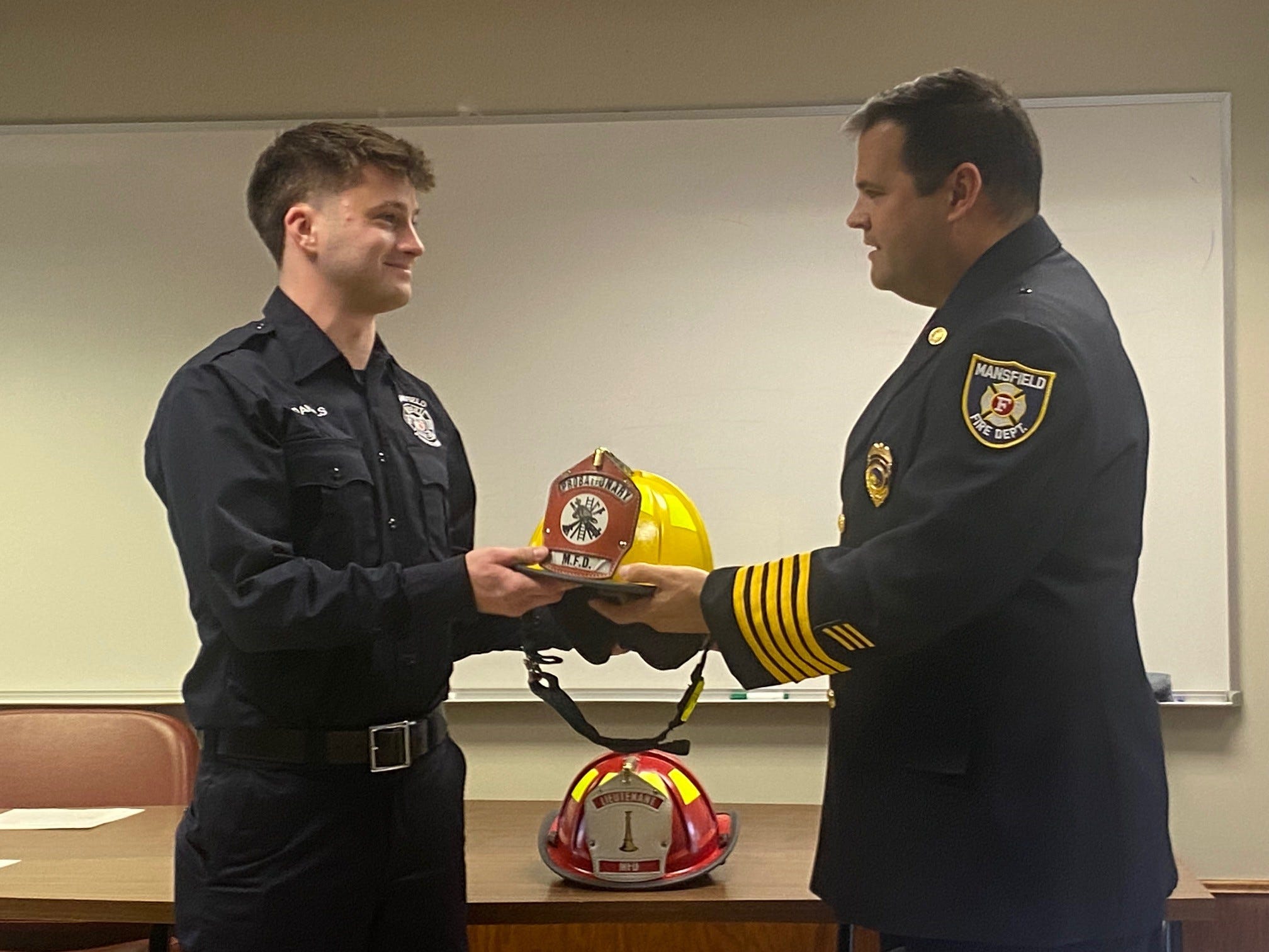 Mansfield firefighter joins department as colleague promoted to lieutenant