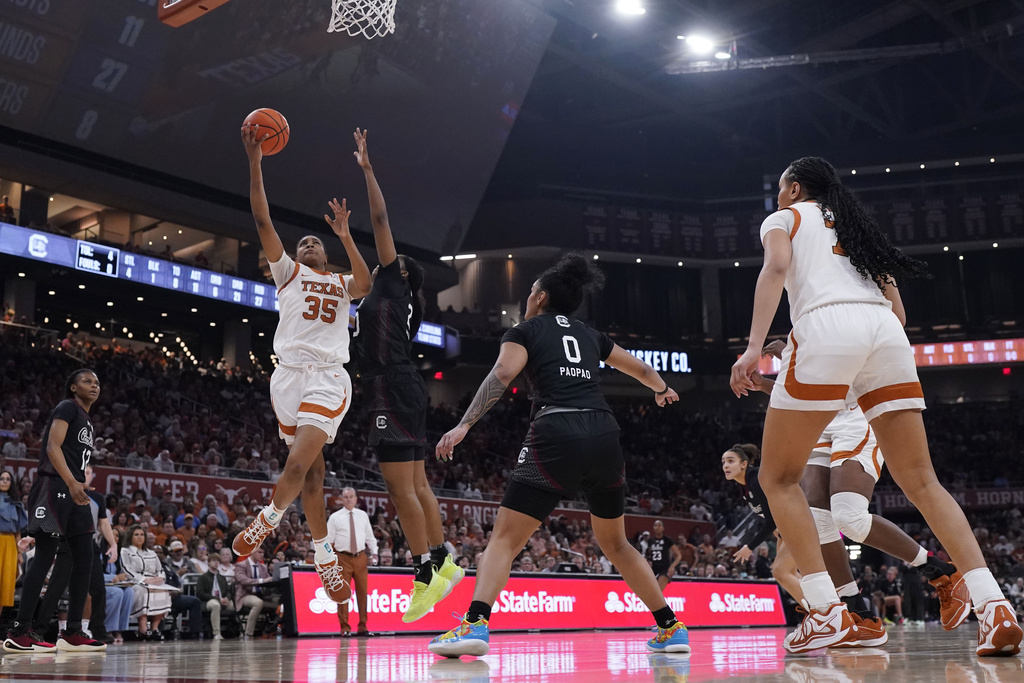 Texas' Madison Booker is AP women's basketball player of the week