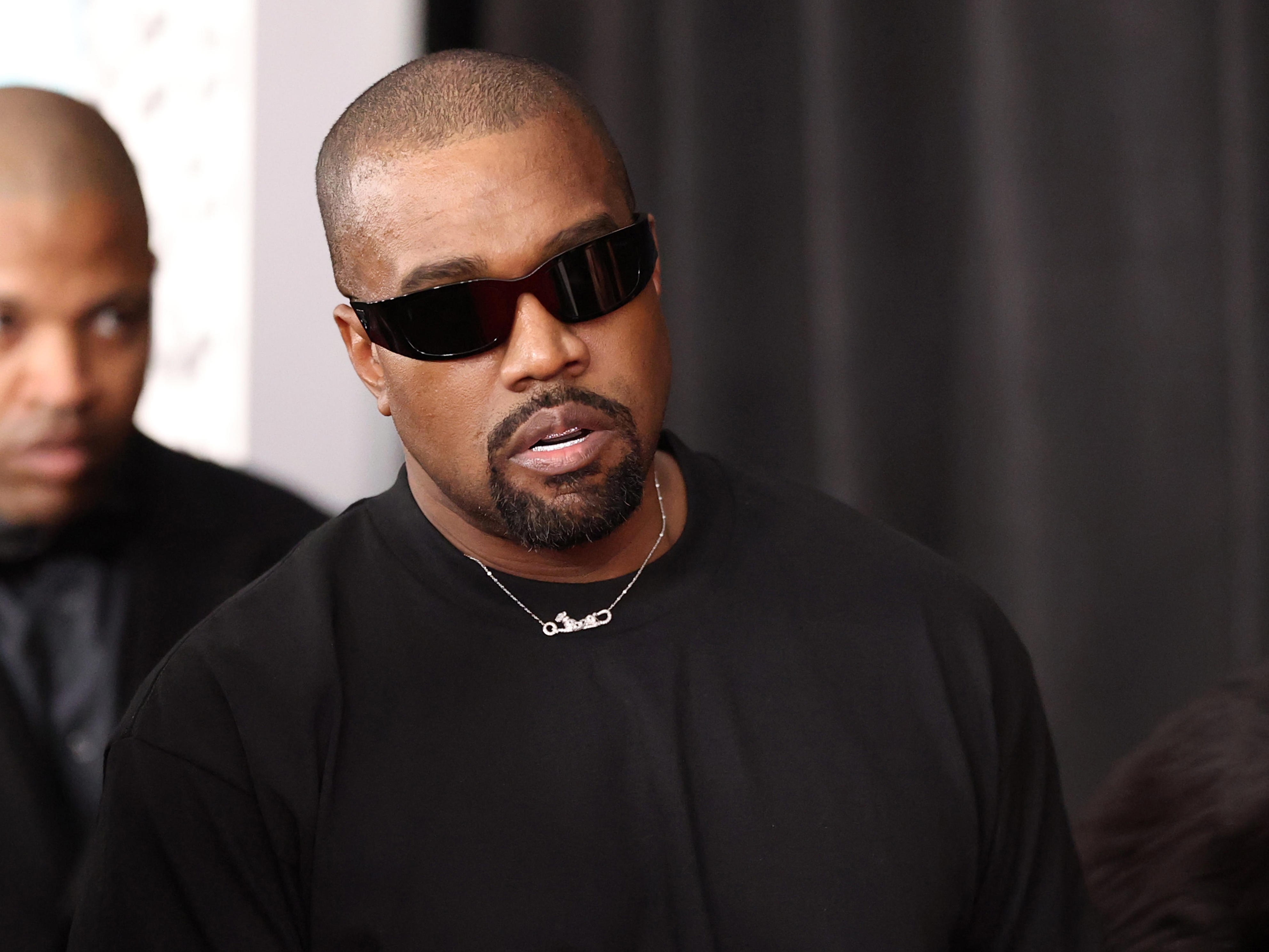 Kanye West's 4 days of controversy: a Super Bowl ad, a swastika T-shirt ...