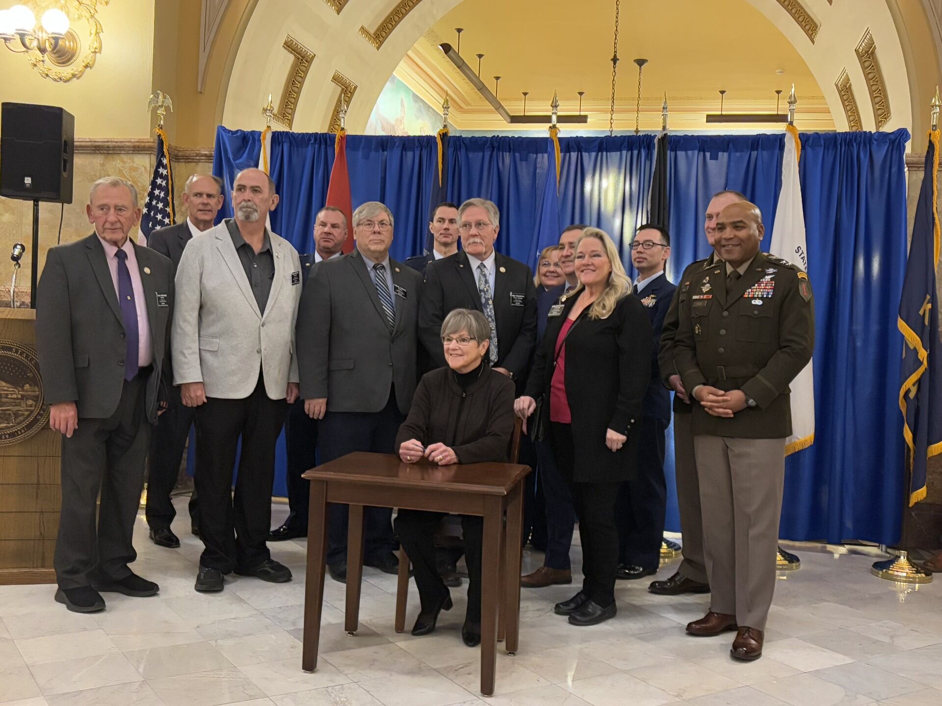 Gov. Kelly honors Armed Forces by signing proclamation