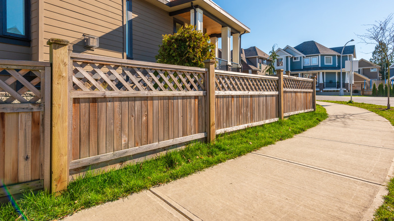 The Worst Type Of Wood Fence Material & The Major Downsides To Be Aware Of