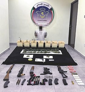 Kuwait seizes firearms cache in swoop on drugs