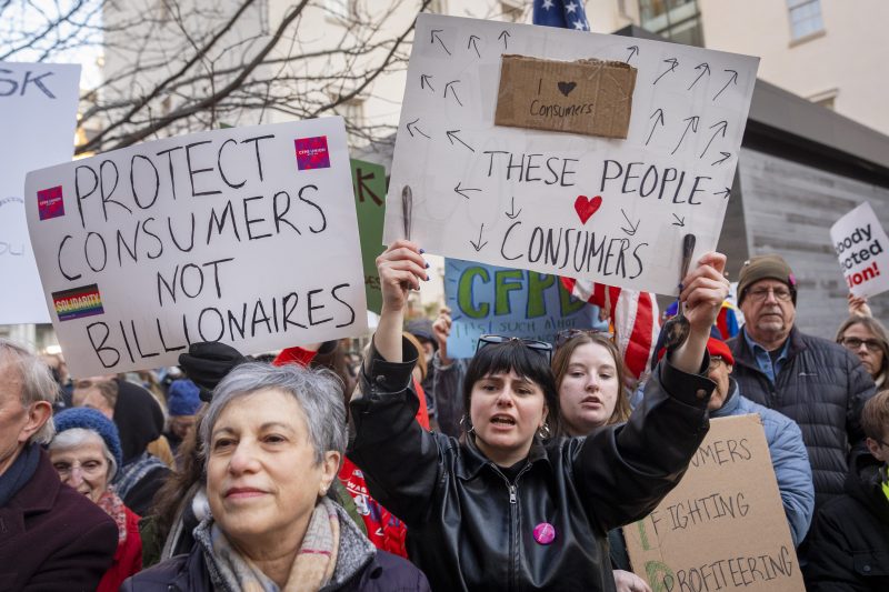 Hundreds gather to protest the shutdown of CFPB