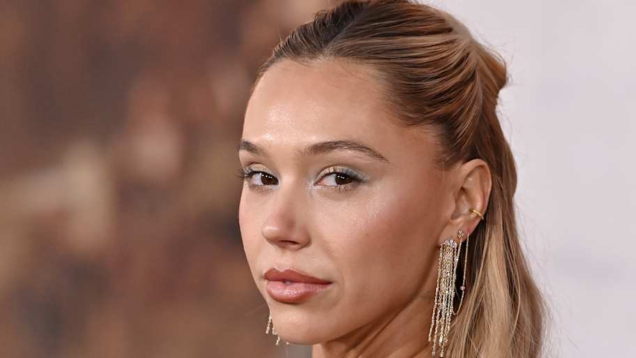 Alexis Ren Gets Playful in Red Hot String Bikini by the Beach