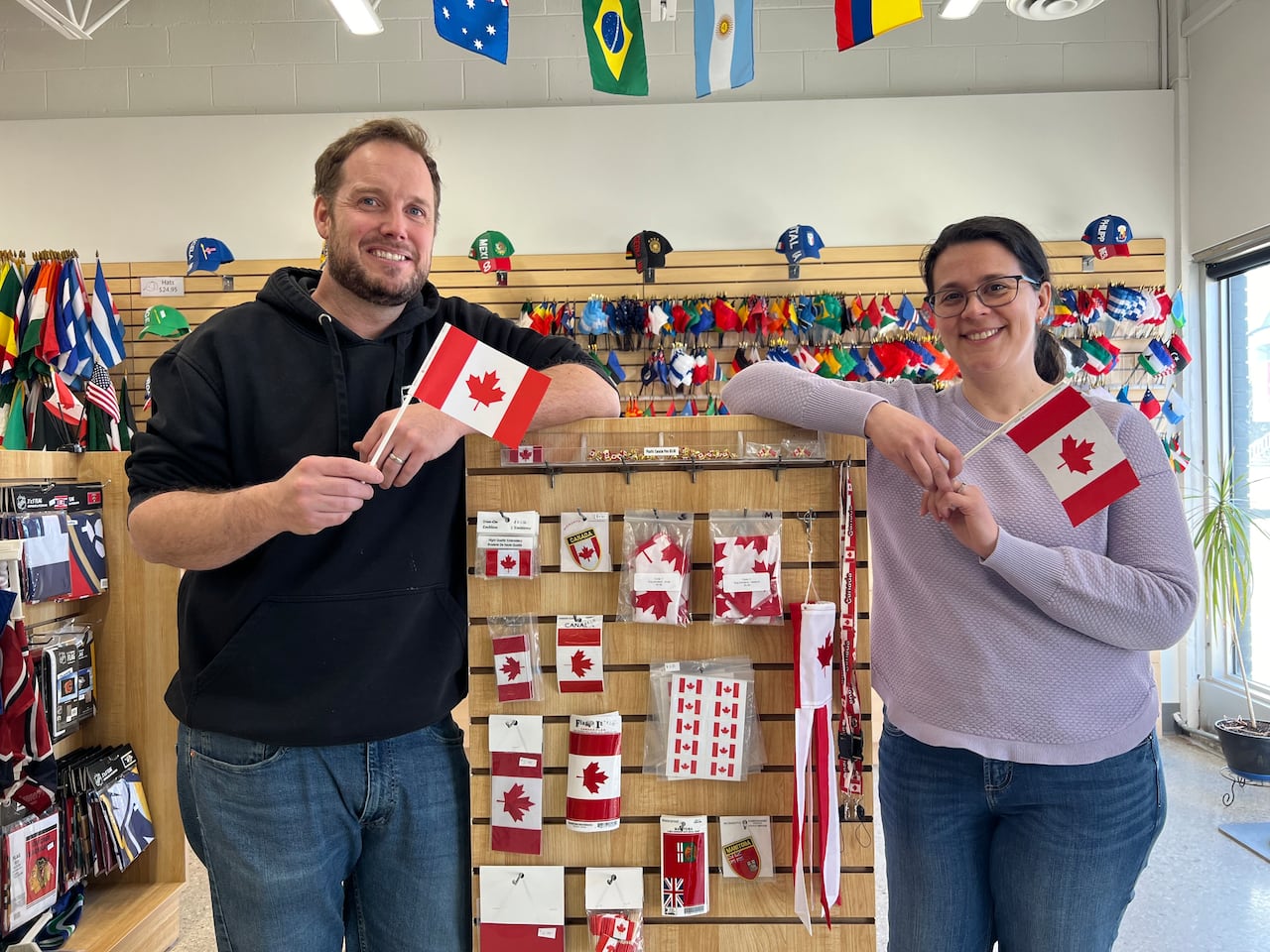 Canadian flags are a hot commodity in Winnipeg as tariff threats stoke ...