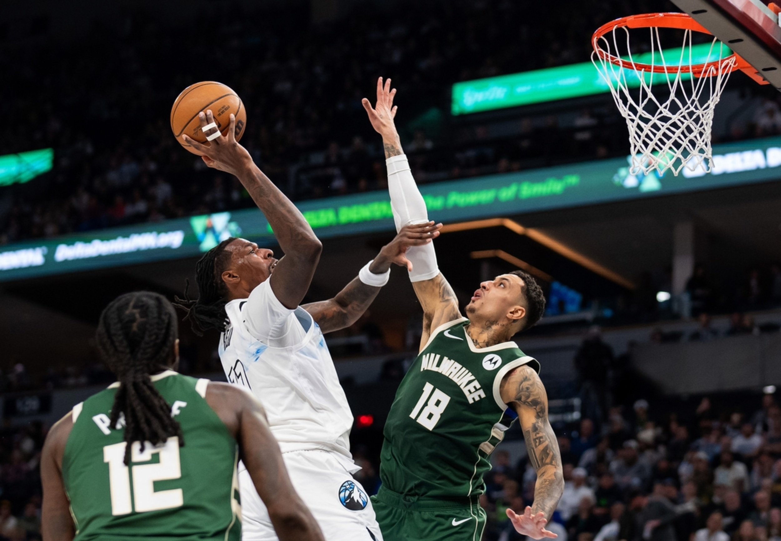 Missing two stars, Bucks edge Wolves on late FTs