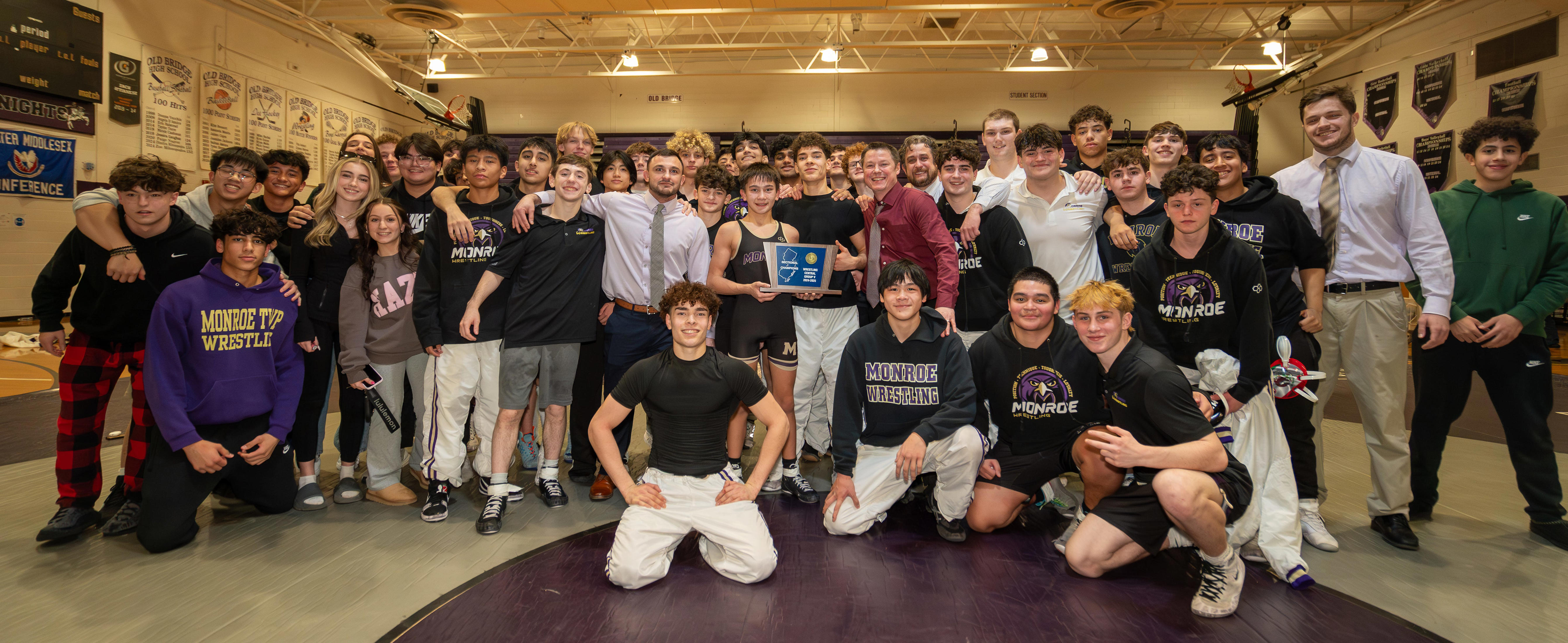 Monroe wrestling finishes strong to win the program's first sectional title