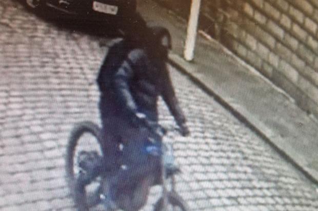 Police release image of two people on bike in criminal damage investigation