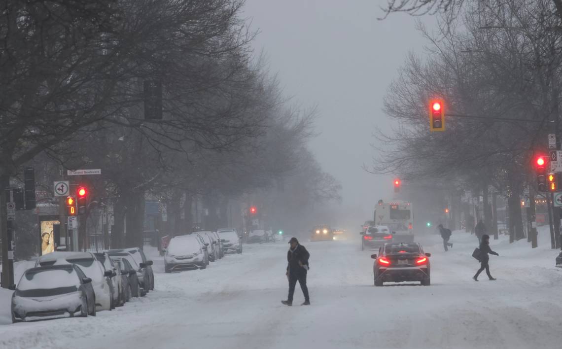 Schools closed and flights delayed as major snowstorm hits Montreal