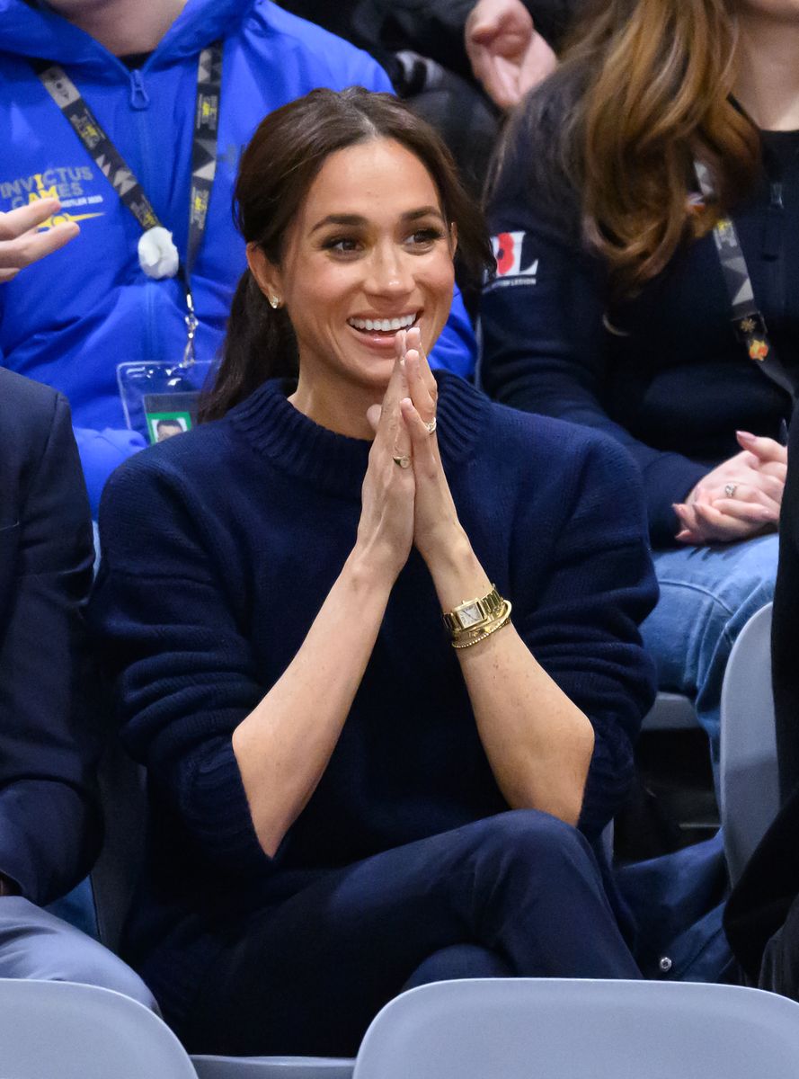 Meghan Markle flashed a signet ring engraved with her and Harry's monogram