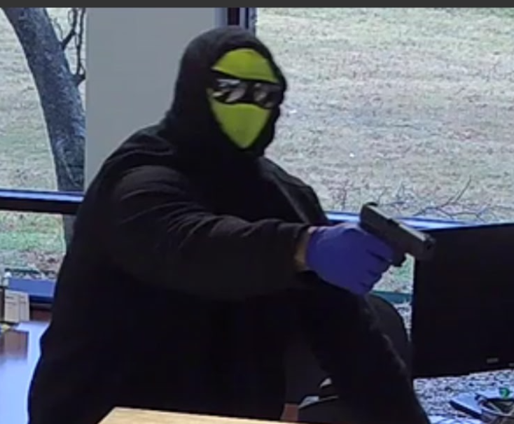 Man robs KCK bank at gunpoint; elementary school receives threat at ...