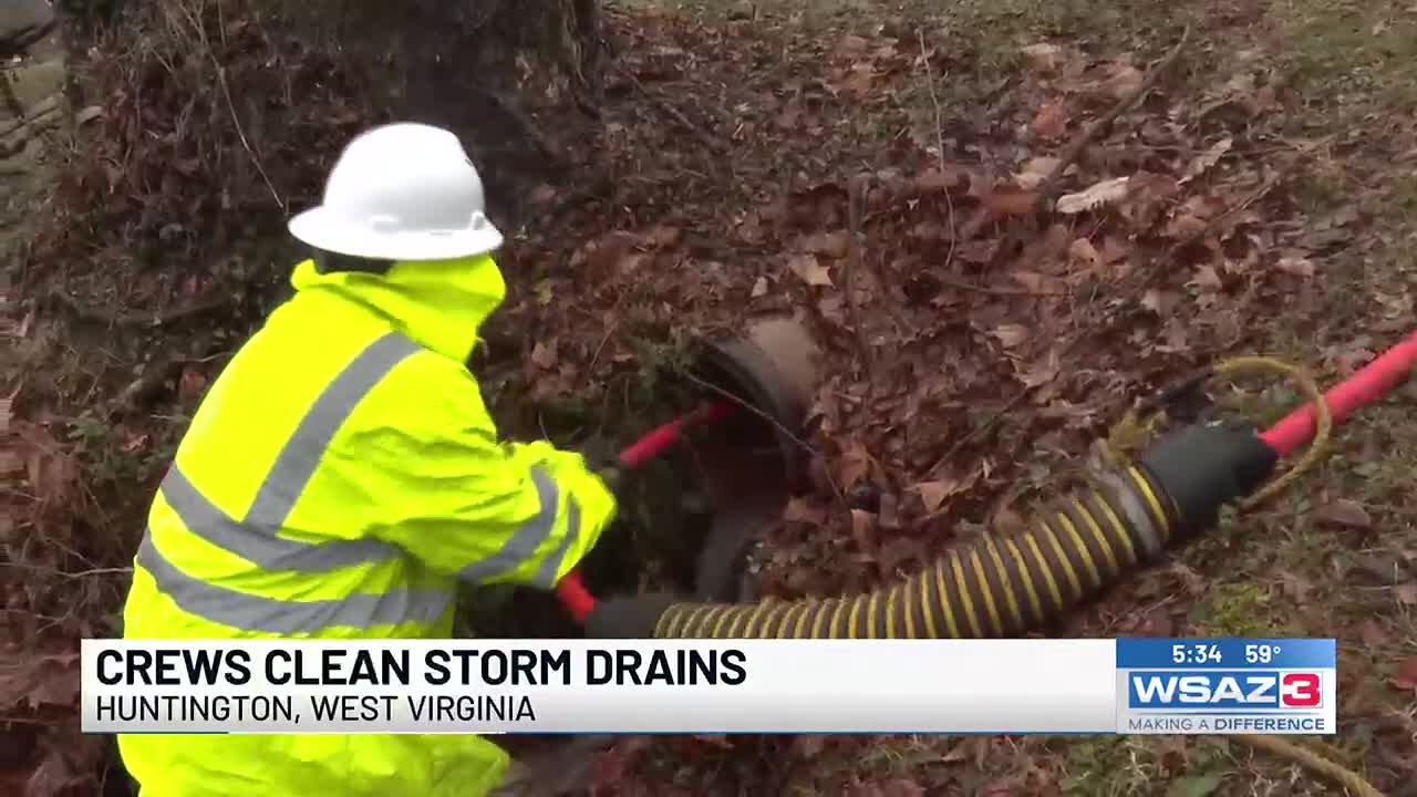 Crews work to clean storm drains