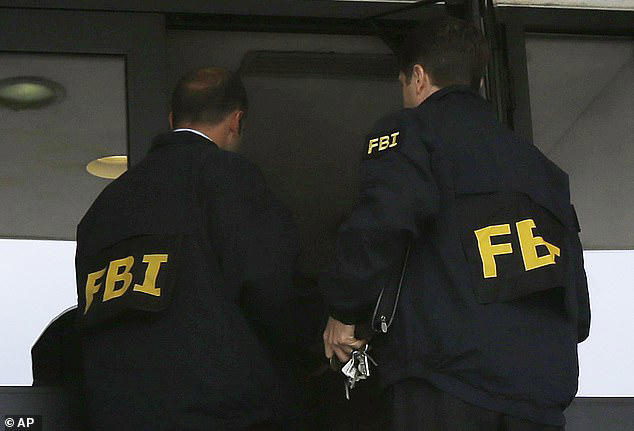 Trump makes shock firing hours after FBI agents are 'escorted out'