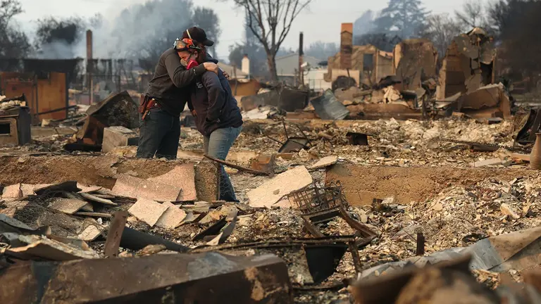 Firefighters battling deadly California wildfires reach critical ...