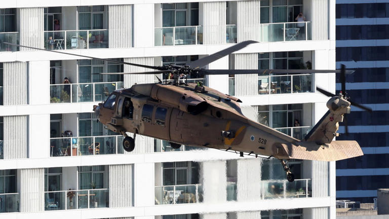 'He has left hell': Israelis welcome home hostages after 15 months in Gaza