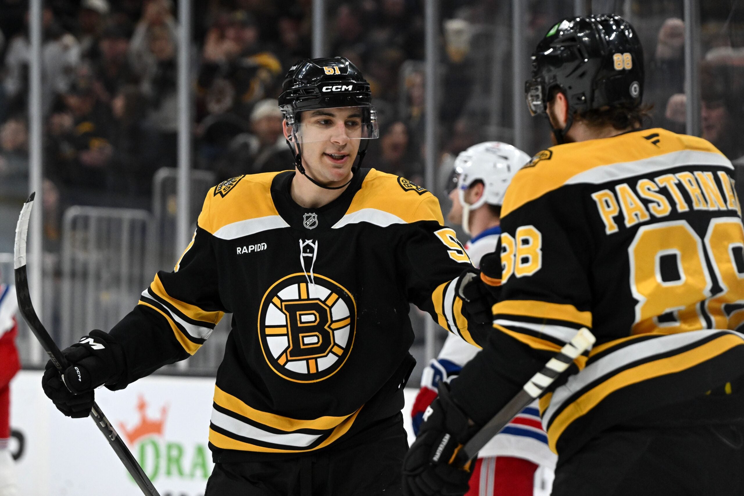 Bruins’ Matt Poitras is fighting through punishment, punching back on ...