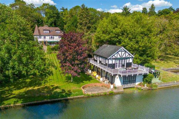 Stunning riverside mansion with boathouse up for sale for £3.75m